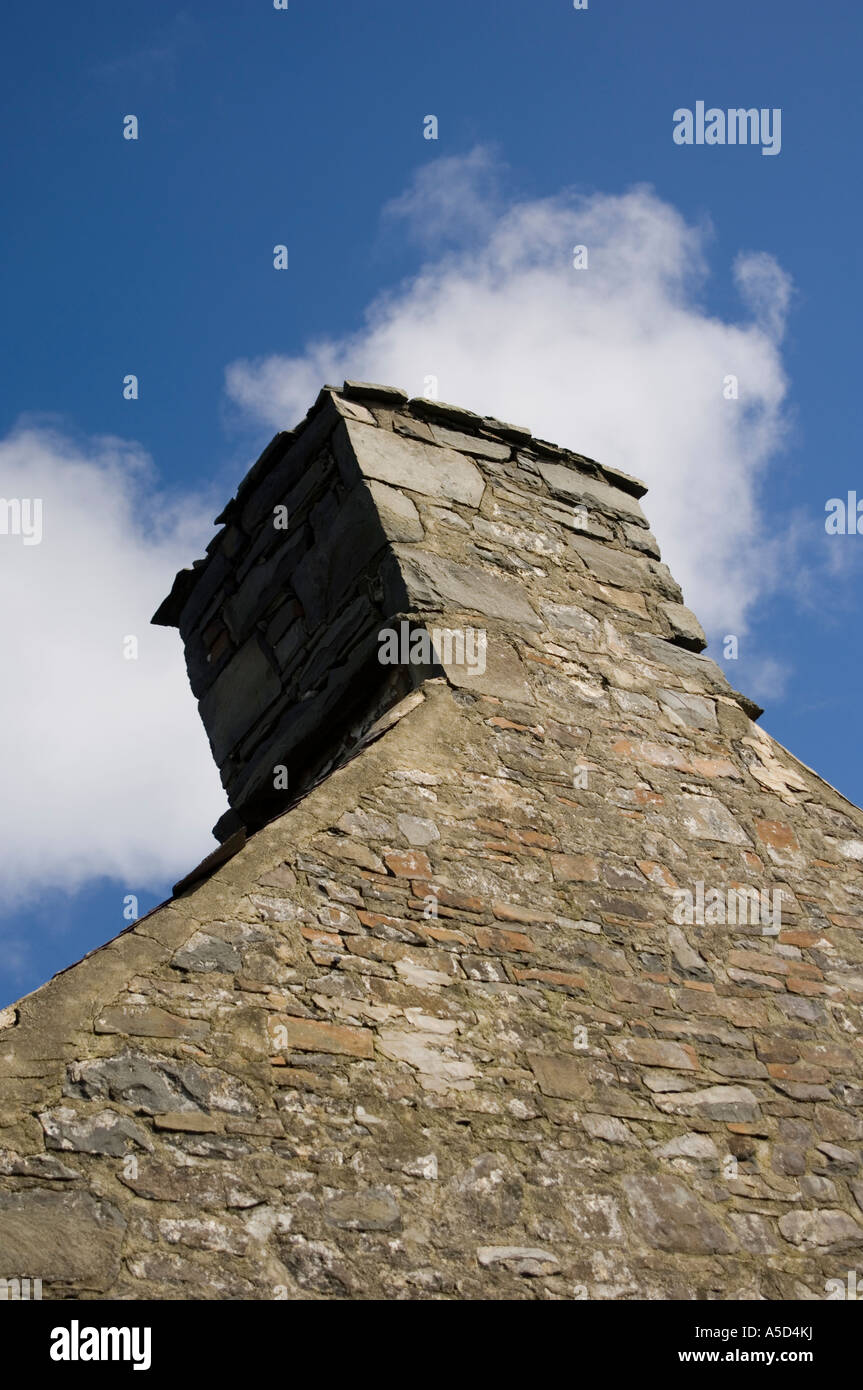 chimney stack welsh cottage against blue sky Stock Photo - Alamy