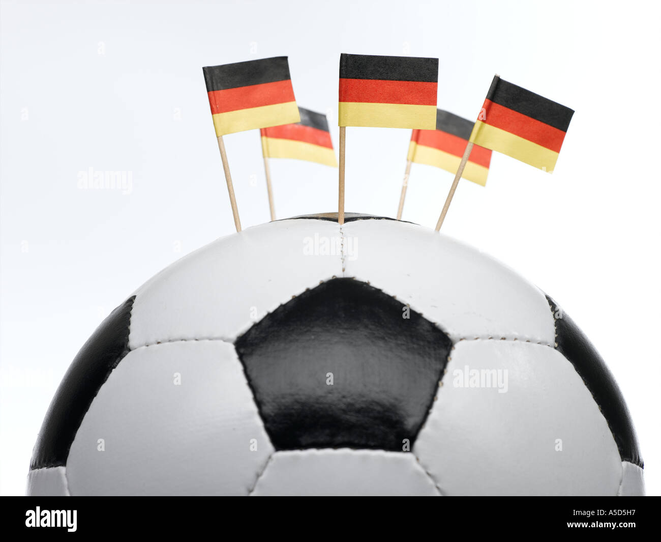 German flags pierced in soccer ball Stock Photo - Alamy