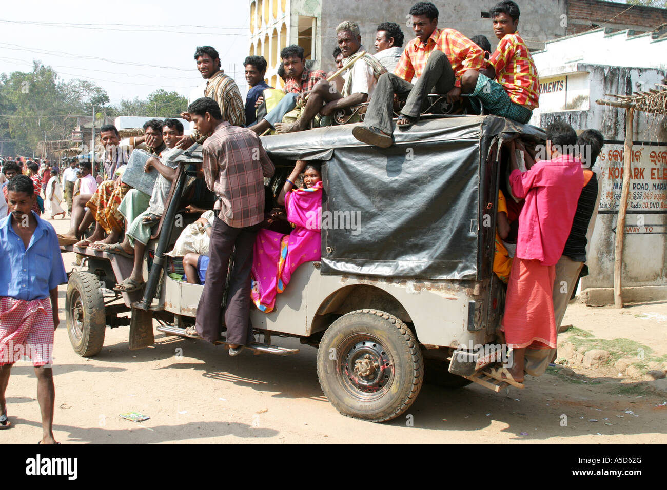 Over loaded ancient jeep in a market,Desia Kondh tribal area of North ...