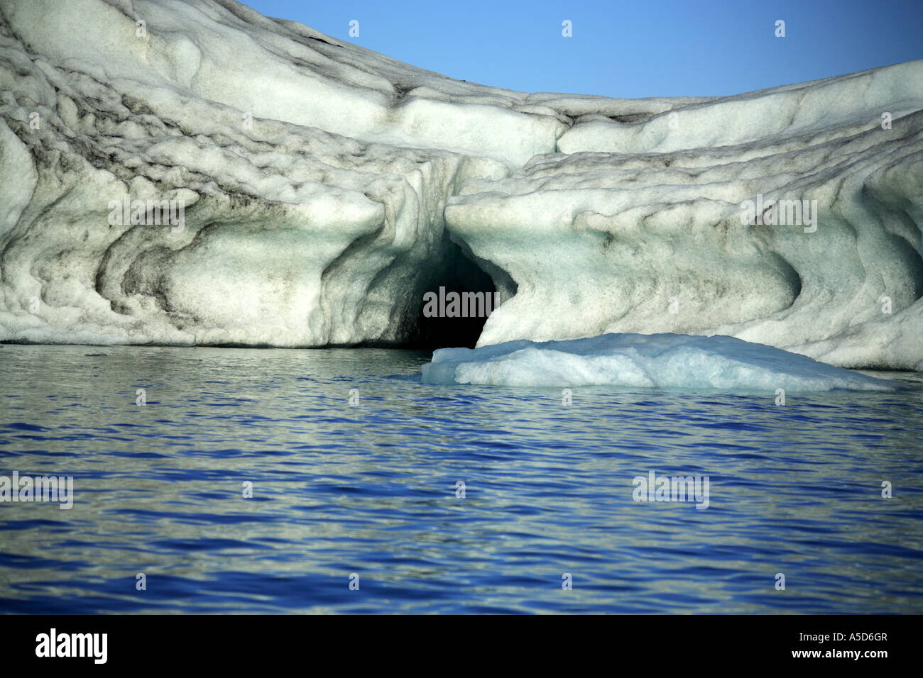 Iceberg with layers of lava through it Jokulsarlon lagoon Iceland Stock ...