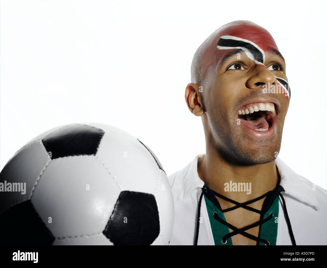 Football fan with Trinidad and Tobago flag painted on face Stock Photo ...