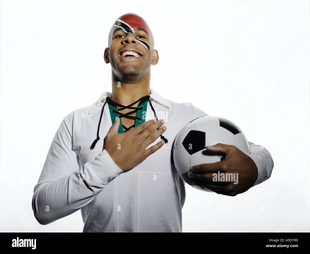 Football fan trinidad flag painted hi-res stock photography and images ...