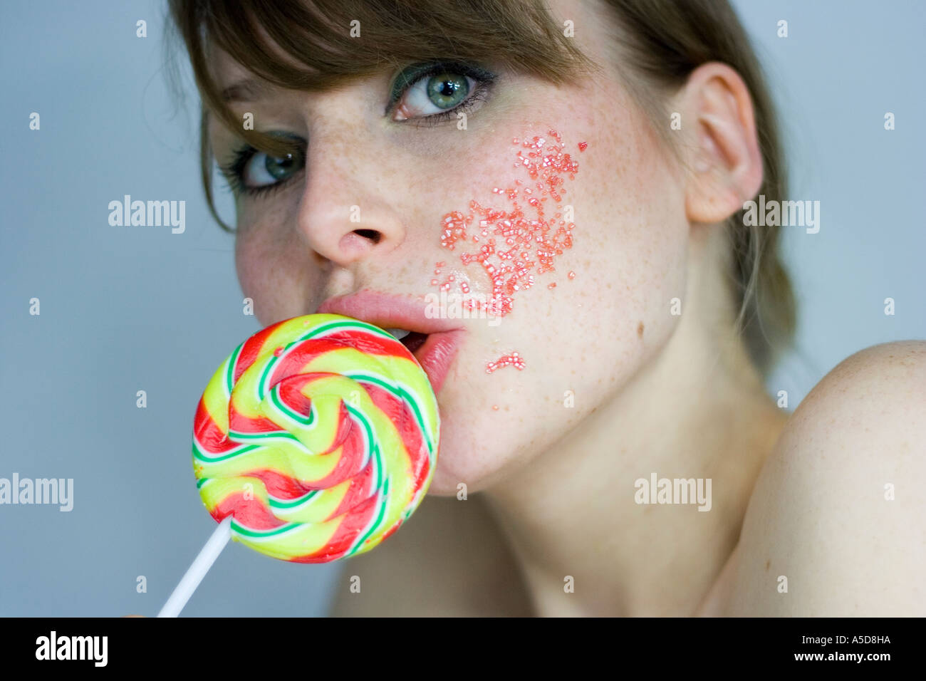 Young woman with lolly Stock Photo - Alamy