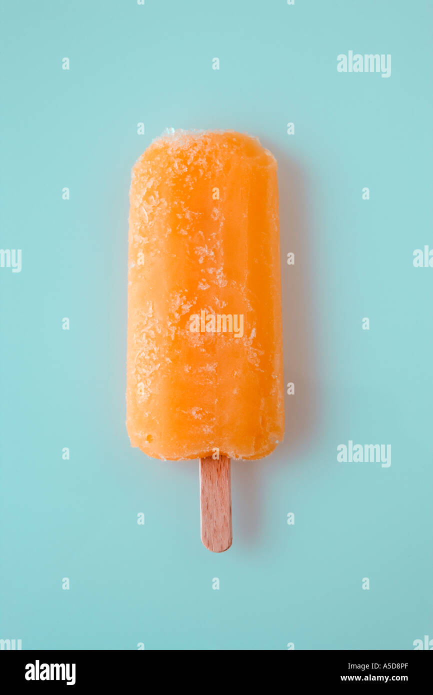 Orange ice lolly stick, overhead view Stock Photo - Alamy