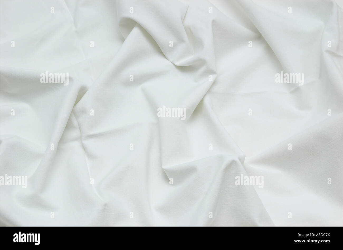 Crumpled bed sheets close up Stock Photo - Alamy