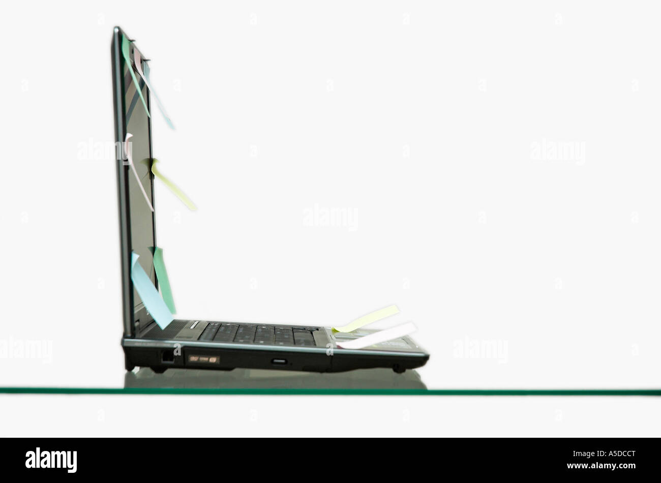 Adhesive notes on laptop side view close up Stock Photo - Alamy