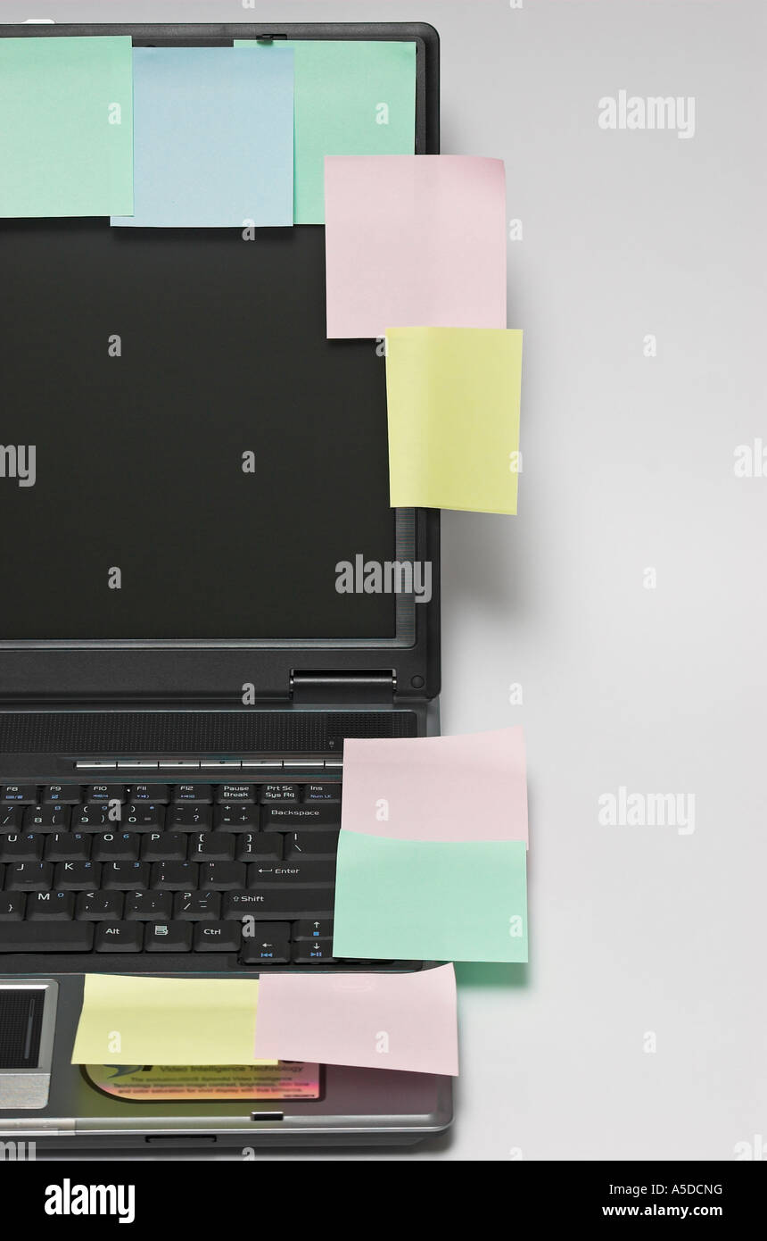 Adhesive notes on laptop front view close up Stock Photo - Alamy