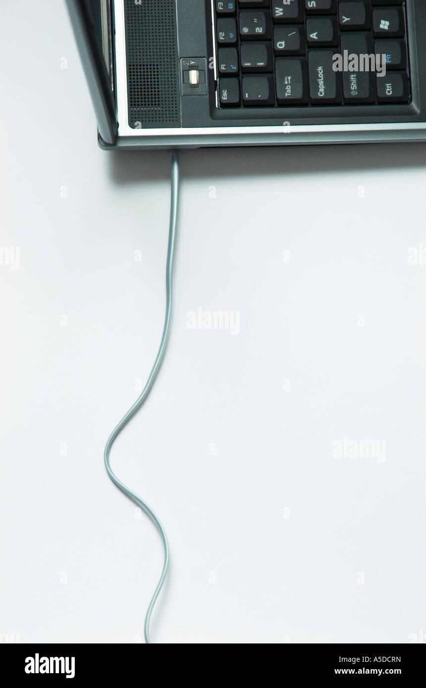 Telephone Cable Plugging into Laptop Stock Photo - Alamy