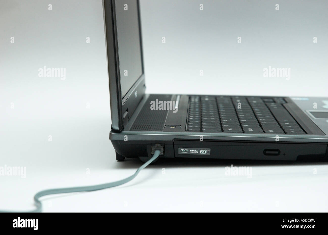 Telephone Cable Plugging into Laptop Stock Photo - Alamy