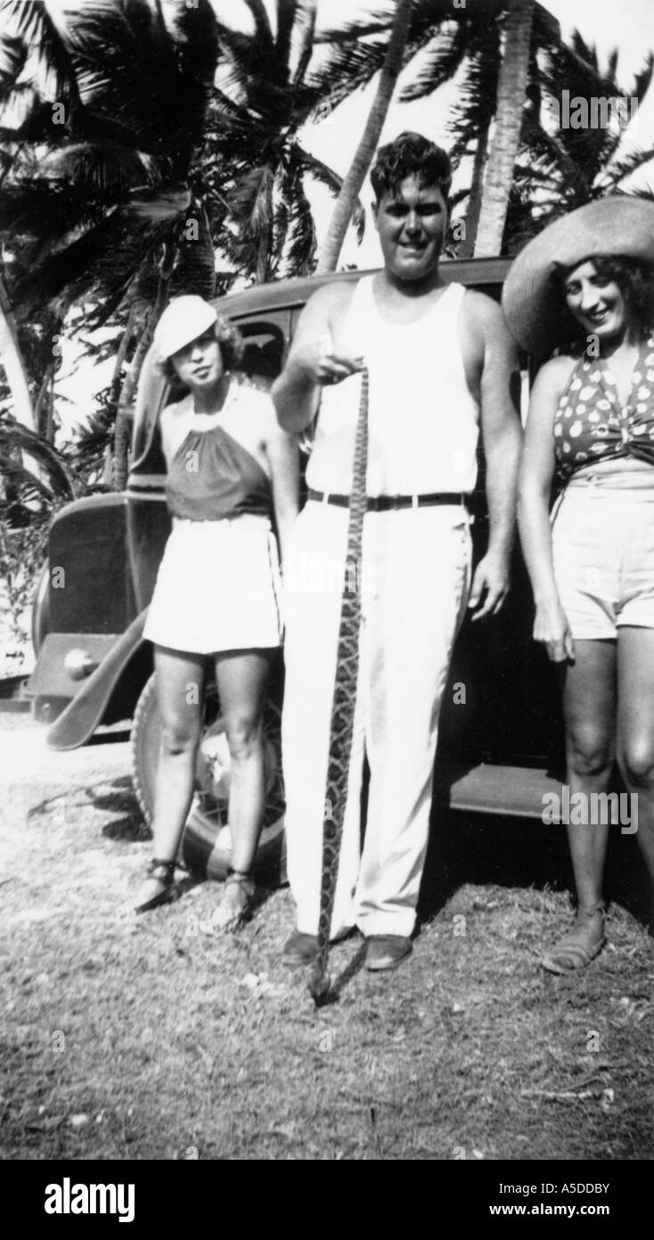 Man holding dead snake hi-res stock photography and images - Alamy