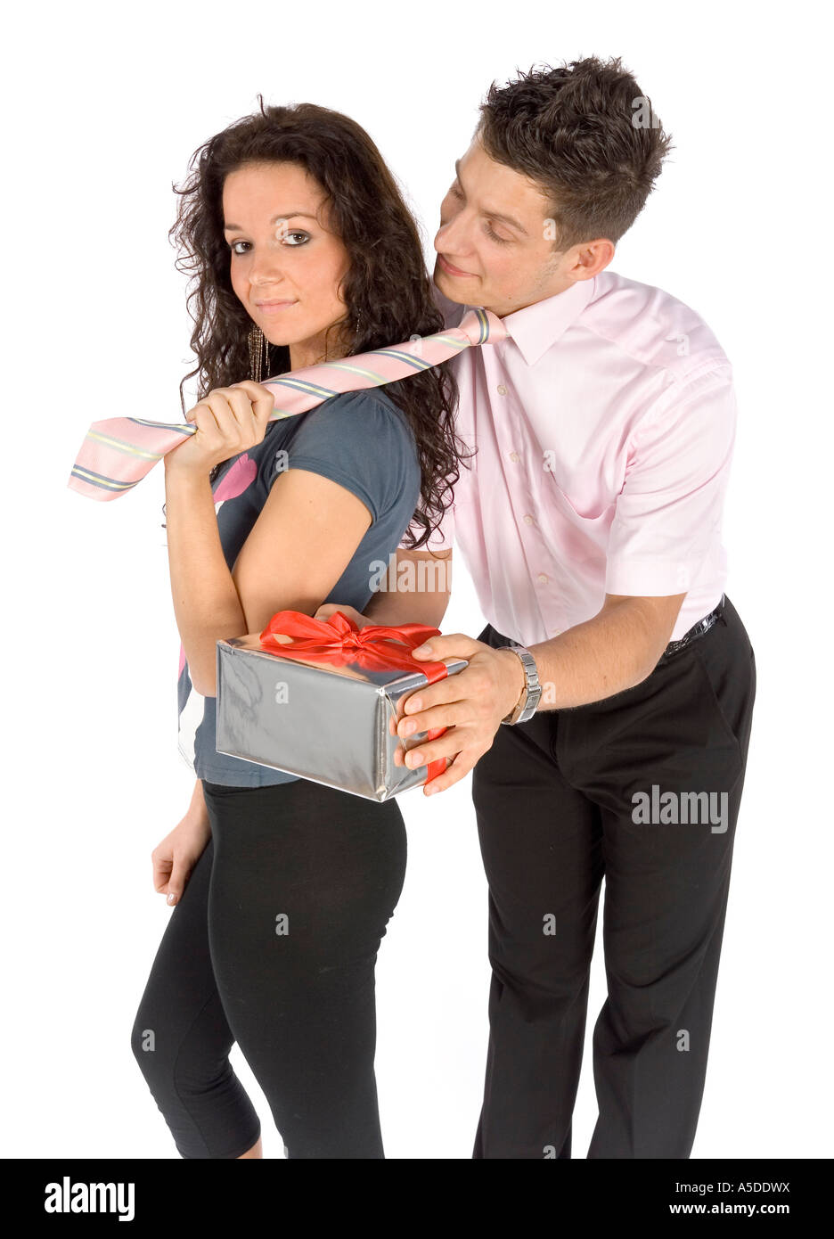young couple slave of love white background Stock Photo - Alamy