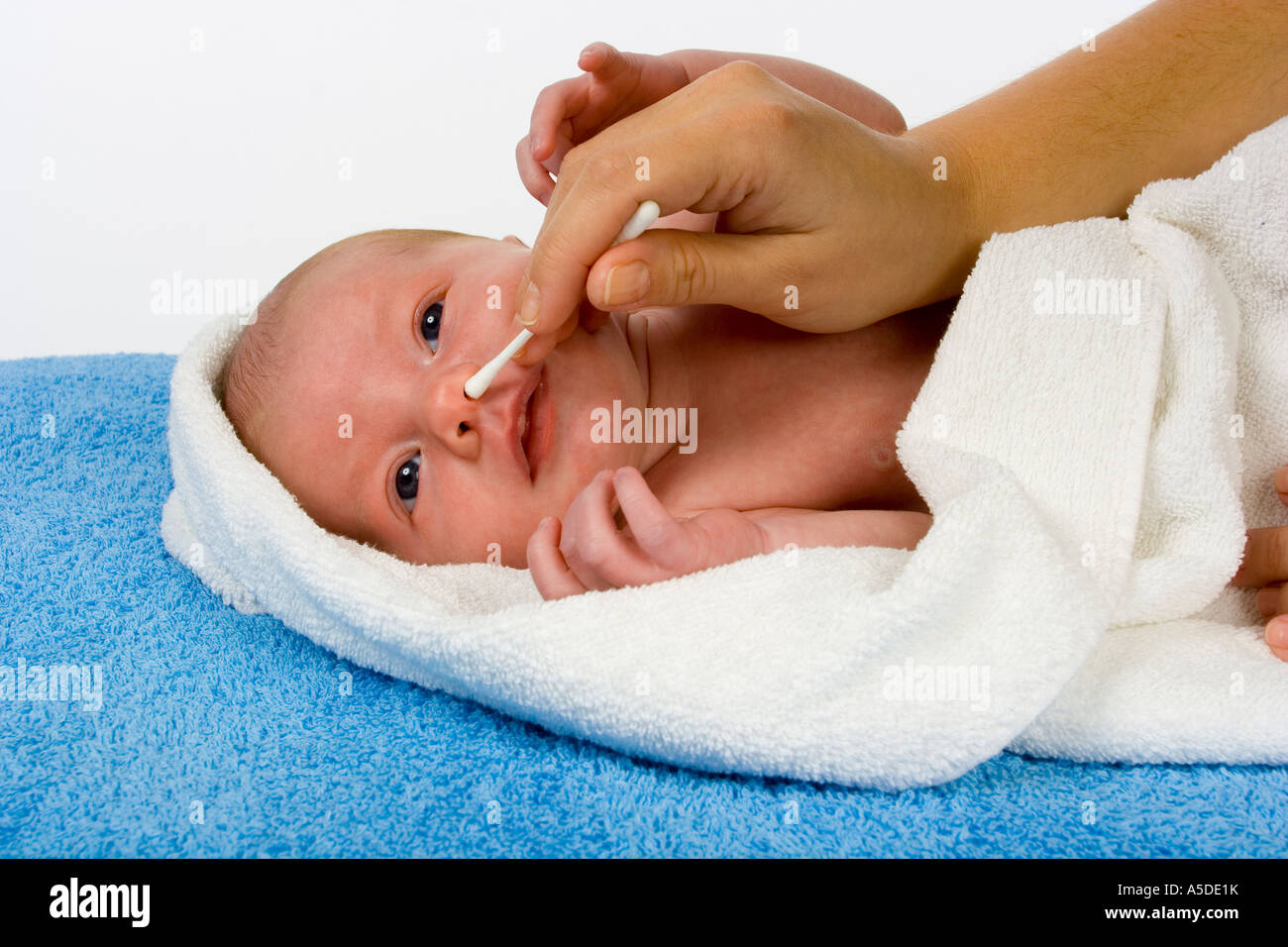 woman hand cleans baby s nose Stock Photo - Alamy