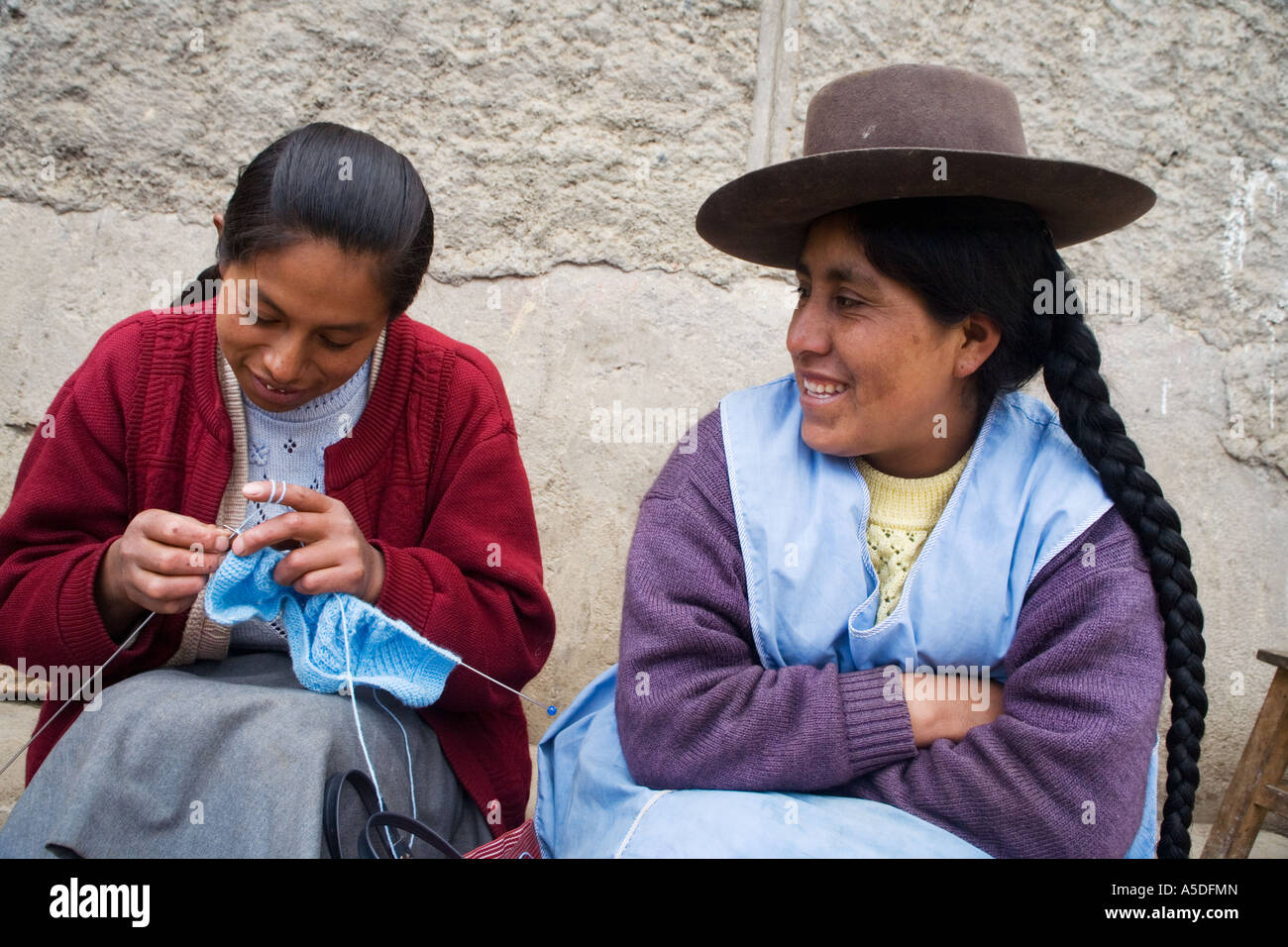 Two Inca woman from the Andes knit in Huancarani village near Cuzco ...