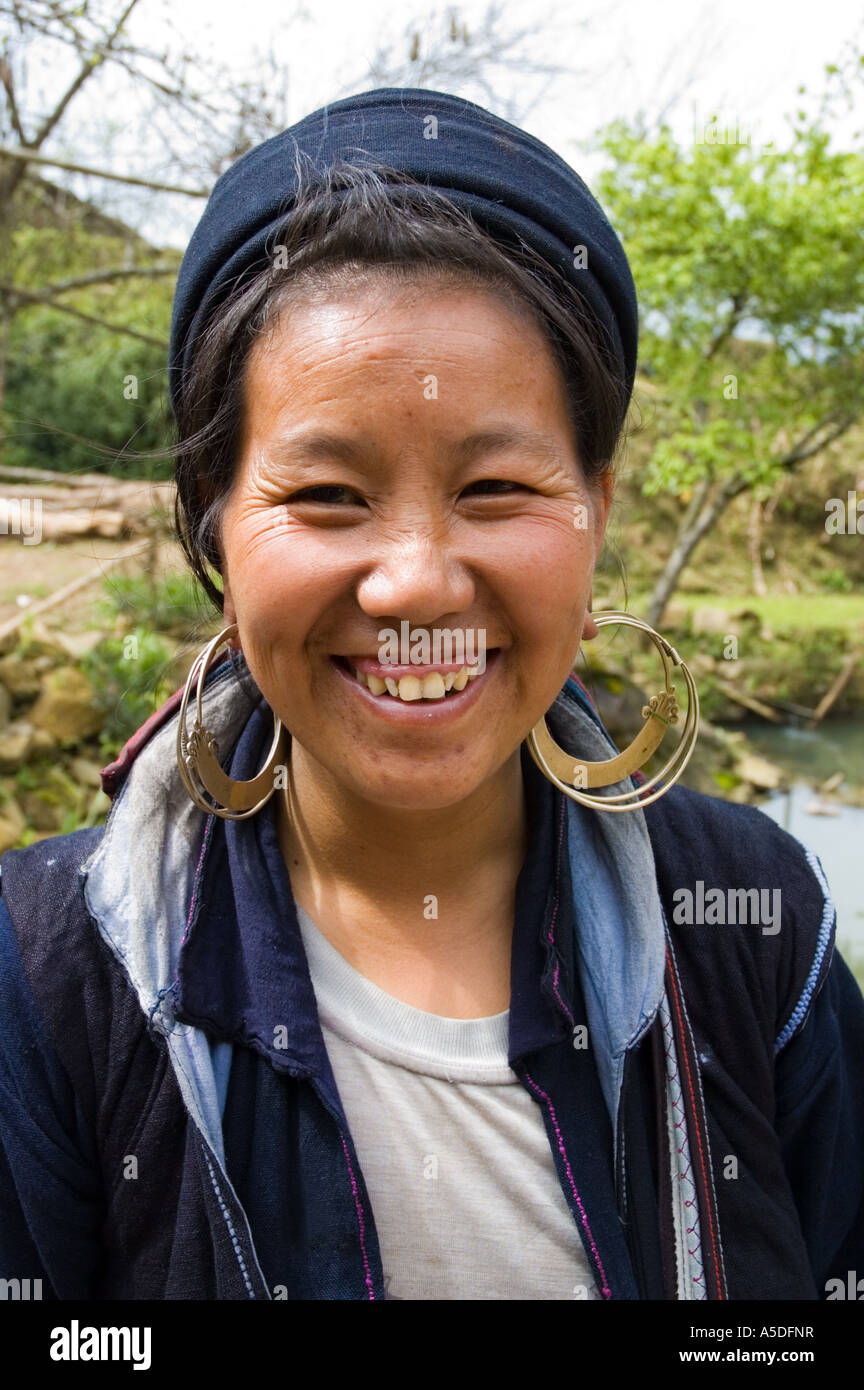 A Black Hmong tribeswoman smiles in the hills of Sapa Vietnam Stock ...