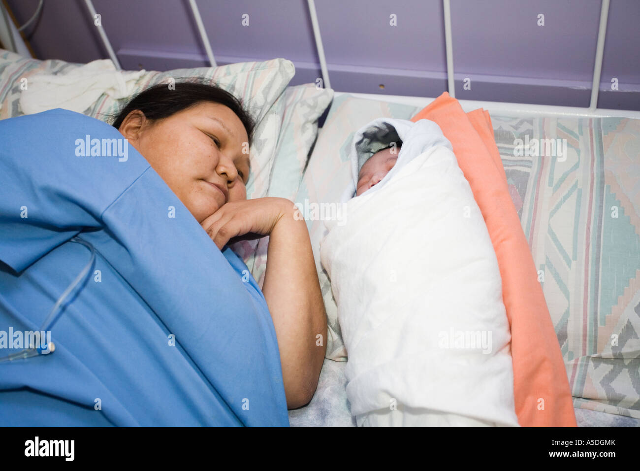 Inuit mother and newborn baby in maternity hospital in Northern Quebec ...