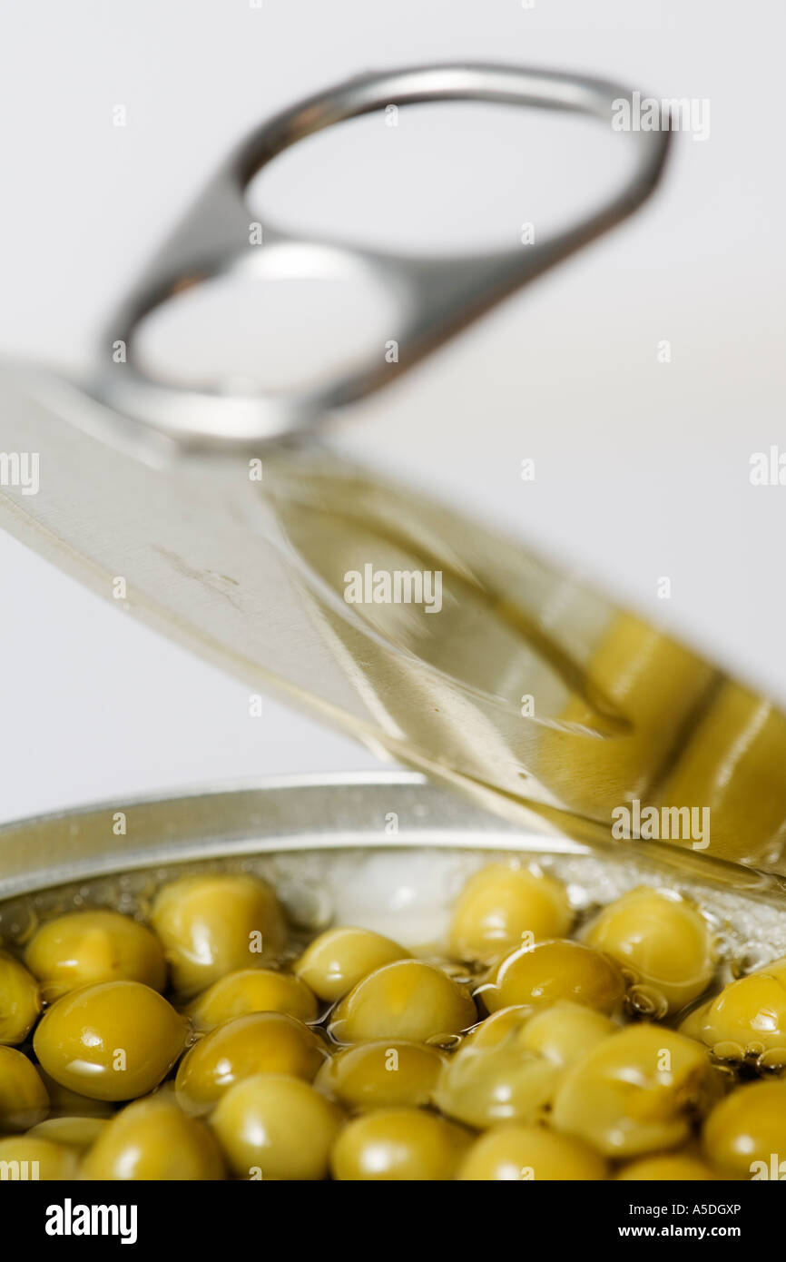 Opened tin of processed peas and ringpull opener Stock Photo - Alamy