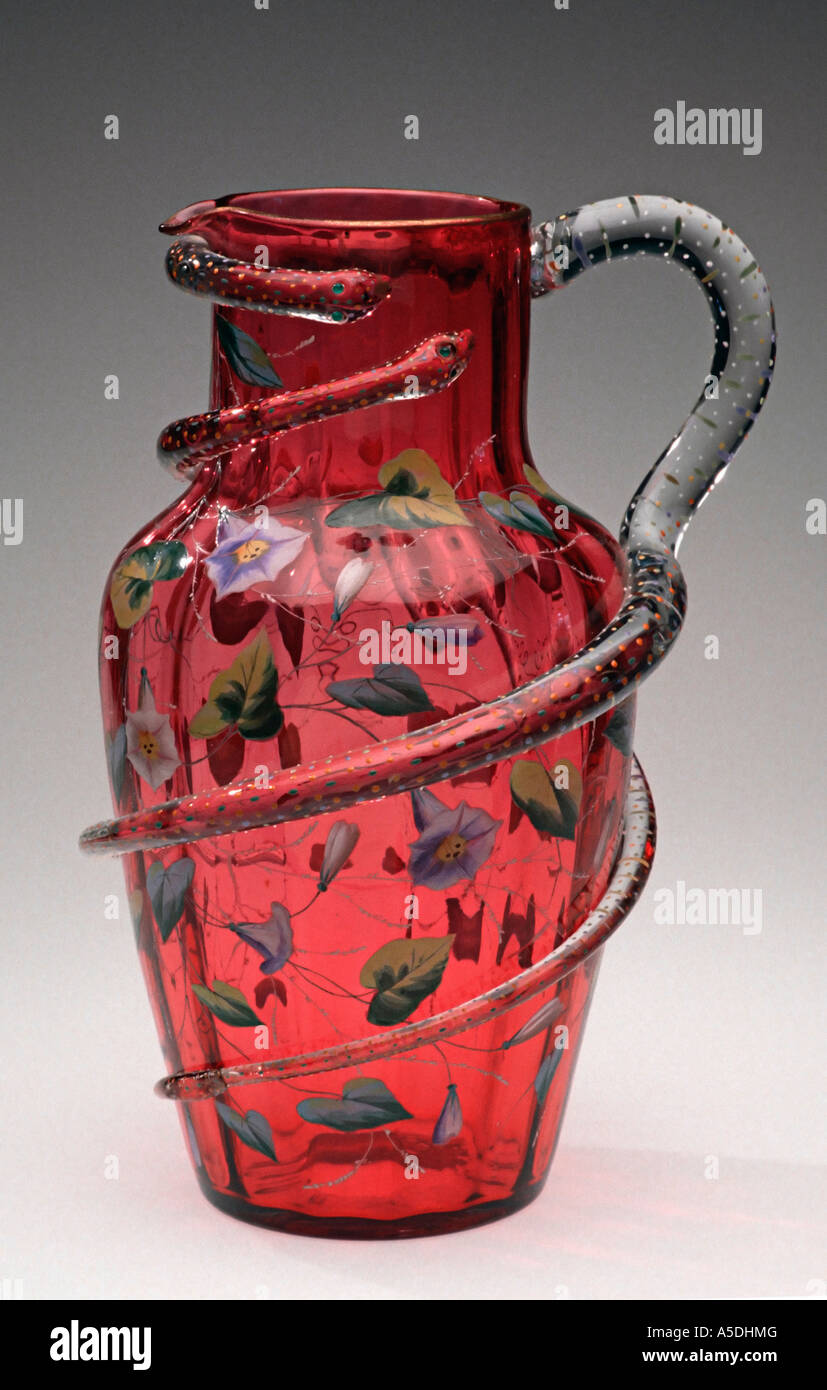 Antique cranberry glass snake handle pitcher Stock Photo - Alamy