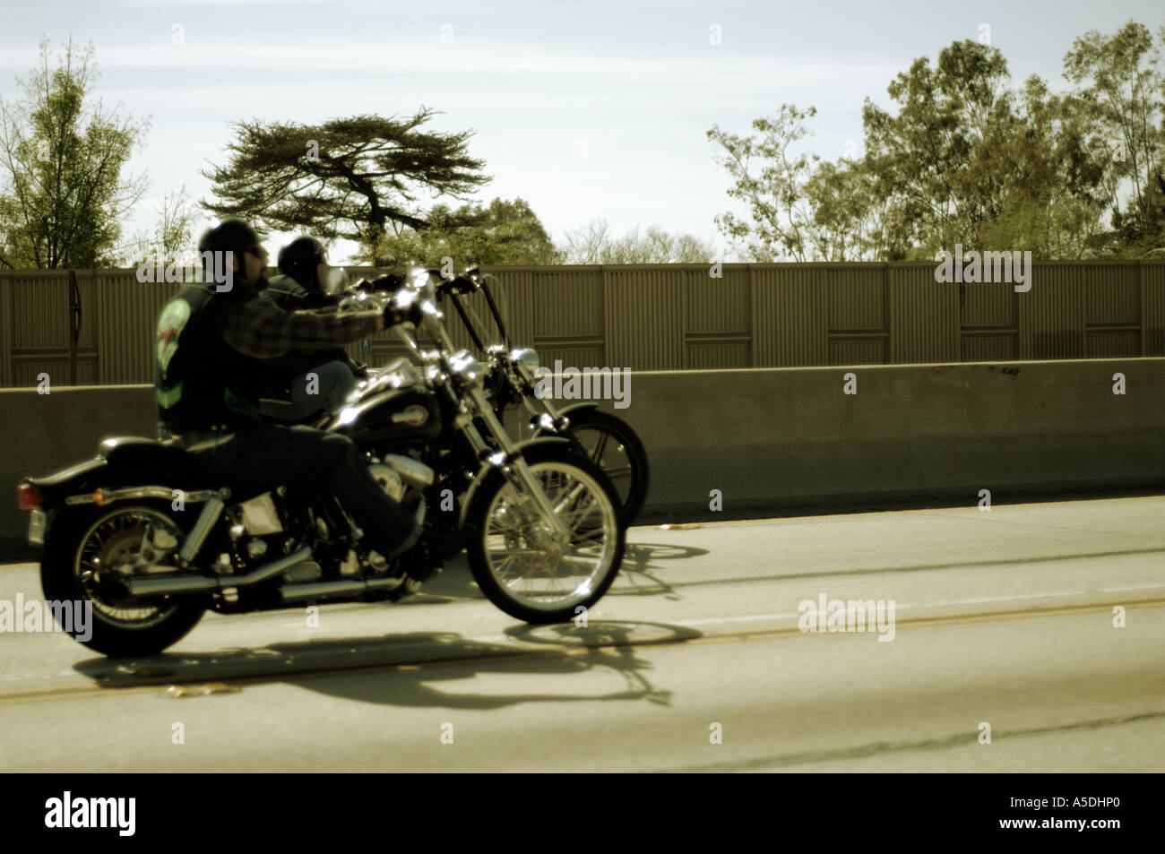 Motorcycle rider on California freeway riding Harley bike Stock Photo ...