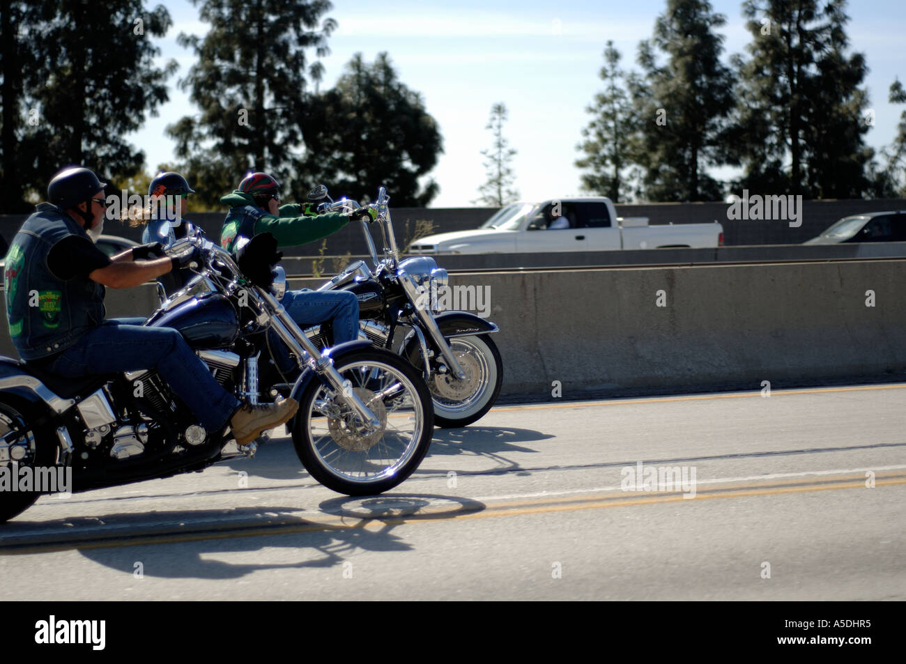 Motorcycle rider on California freeway riding Harley bike Stock Photo ...