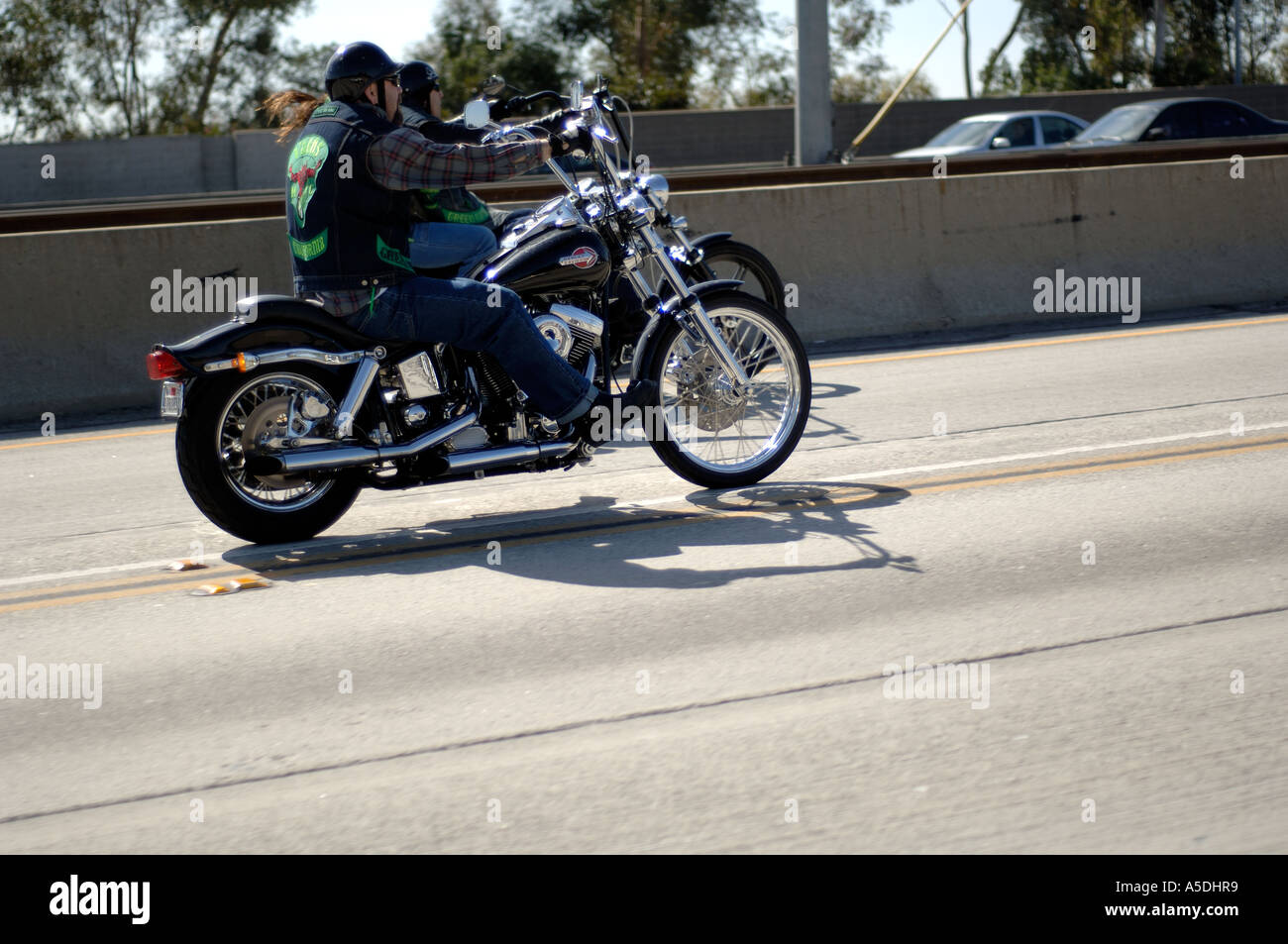 Motorcycle rider on California freeway riding Harley bike Stock Photo ...