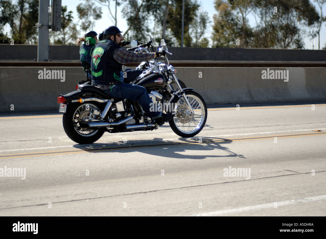 Motorcycle rider on California freeway riding Harley bike Stock Photo ...