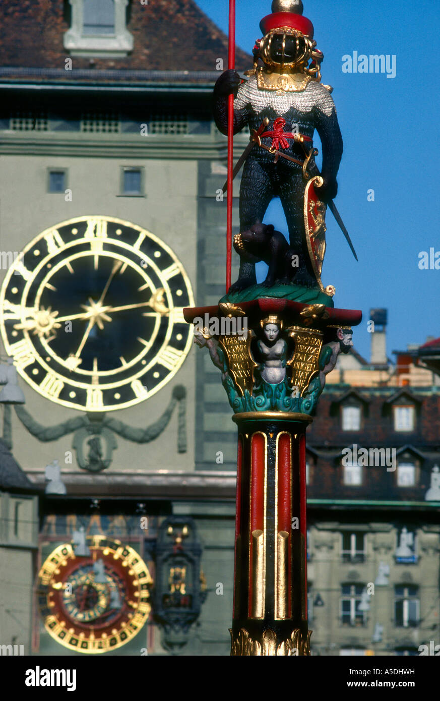 Historical emblem the bear 16th Century fountain against large city in ...