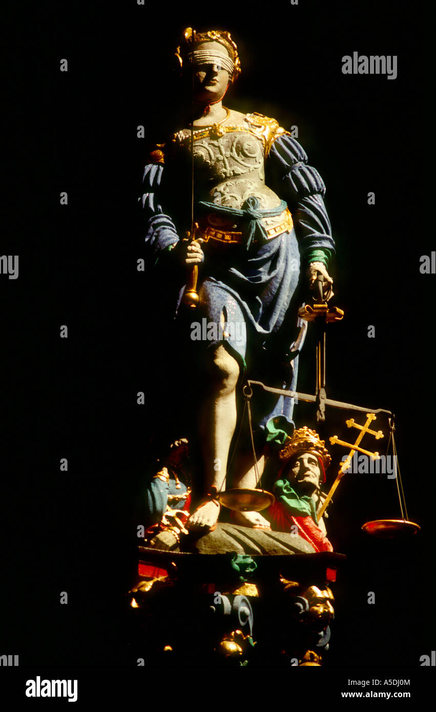 Front night view of statue of woman holding the scales of justice, 16th ...