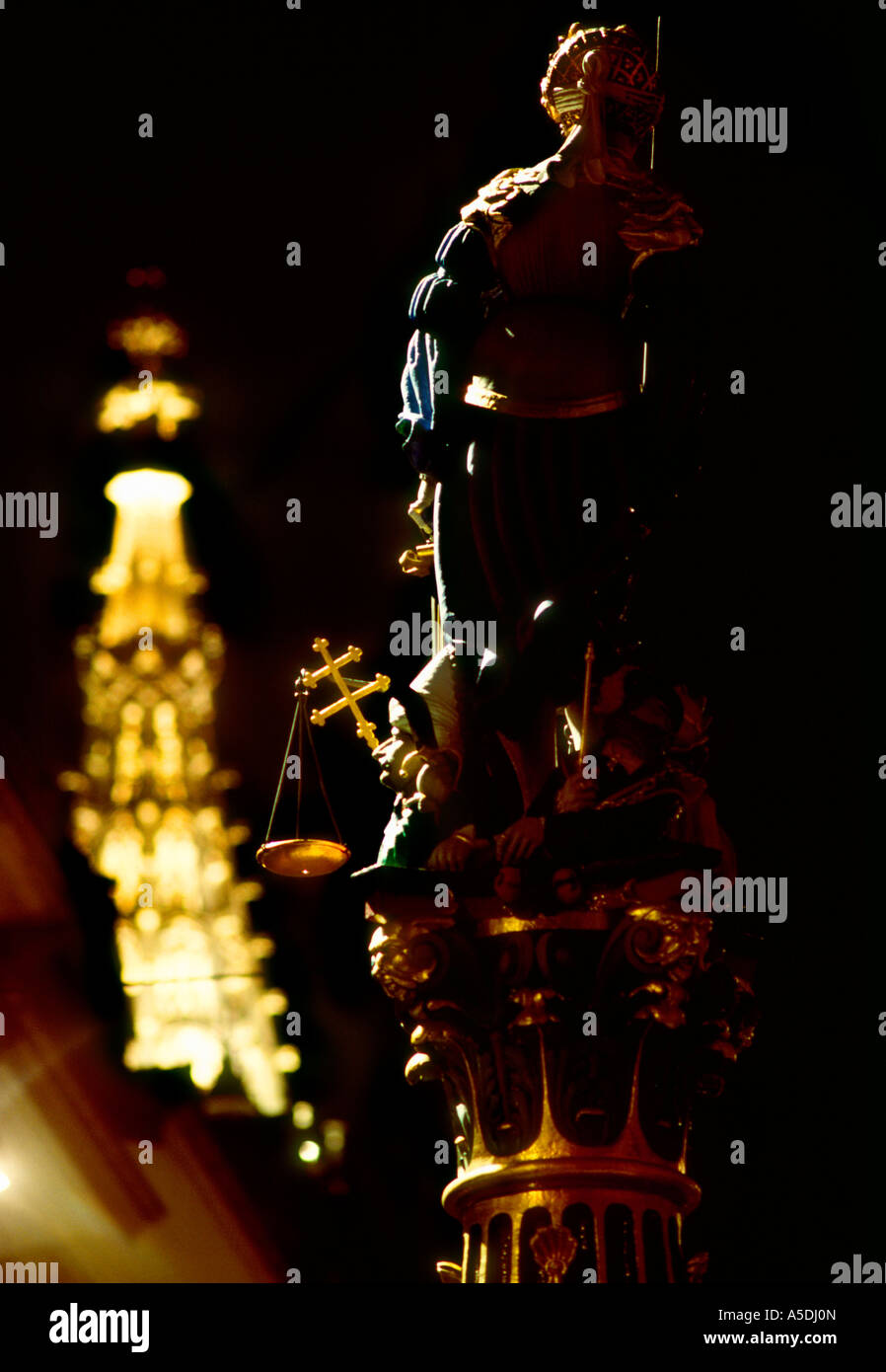 night view of 16th Century colourful fountain against the illuminated ...