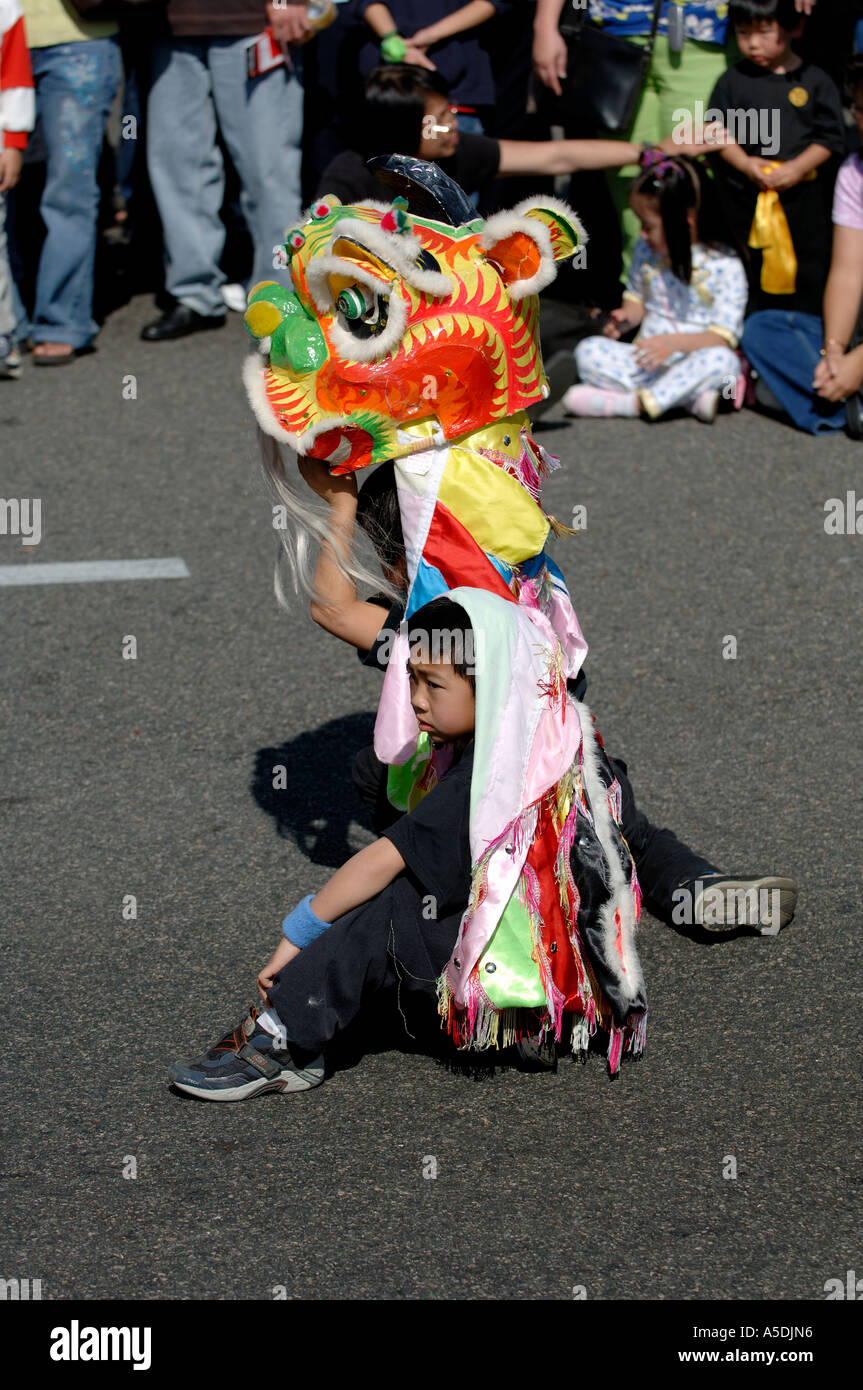 Young boy Chinese dragon dancers at the Chinese Lantern Festival ...