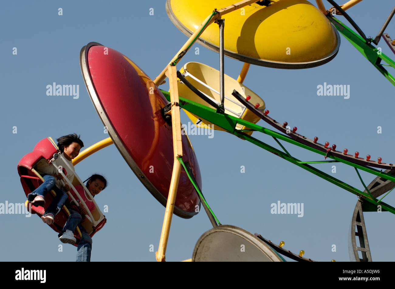 People on amusement park rides at the Chinese Lantern Festival Monterey ...