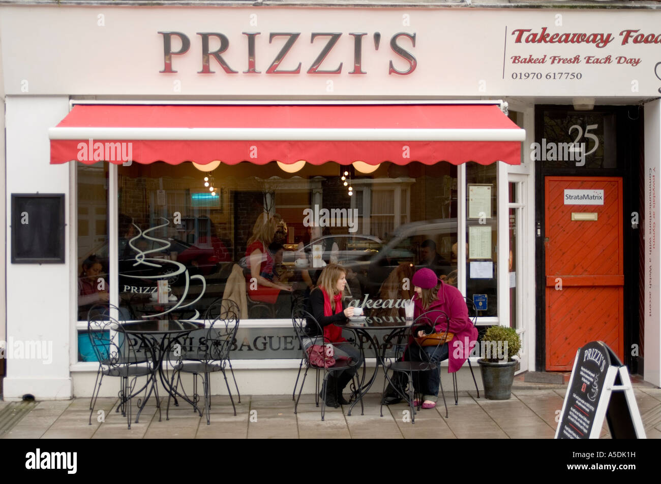 people sitting at pavement tables outside Prizzi s cafe Aberystwyth ...