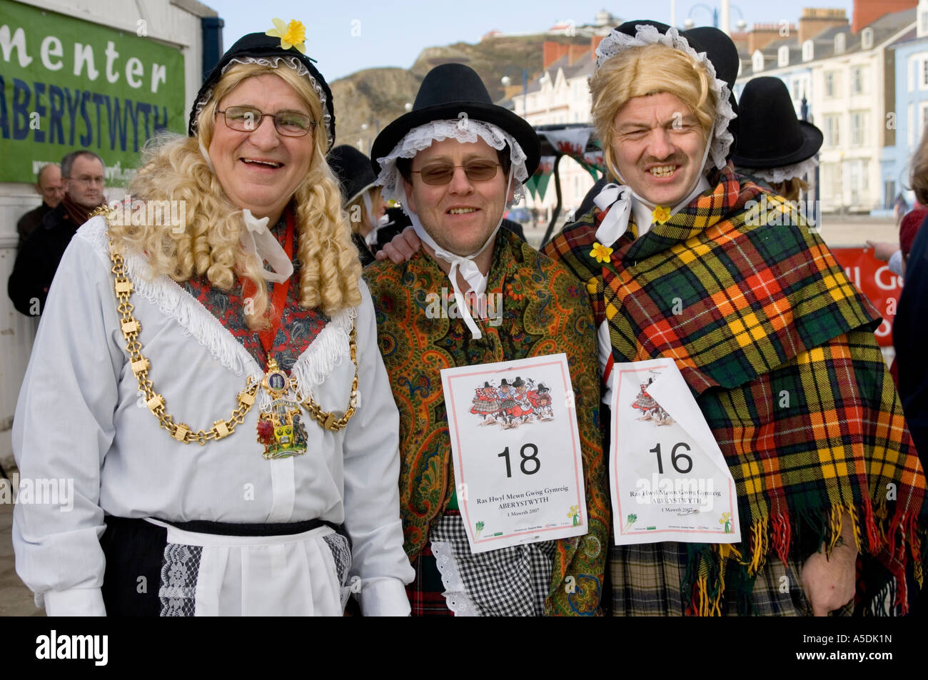 three men dressed in traditional costume annual welsh lady fun run ...