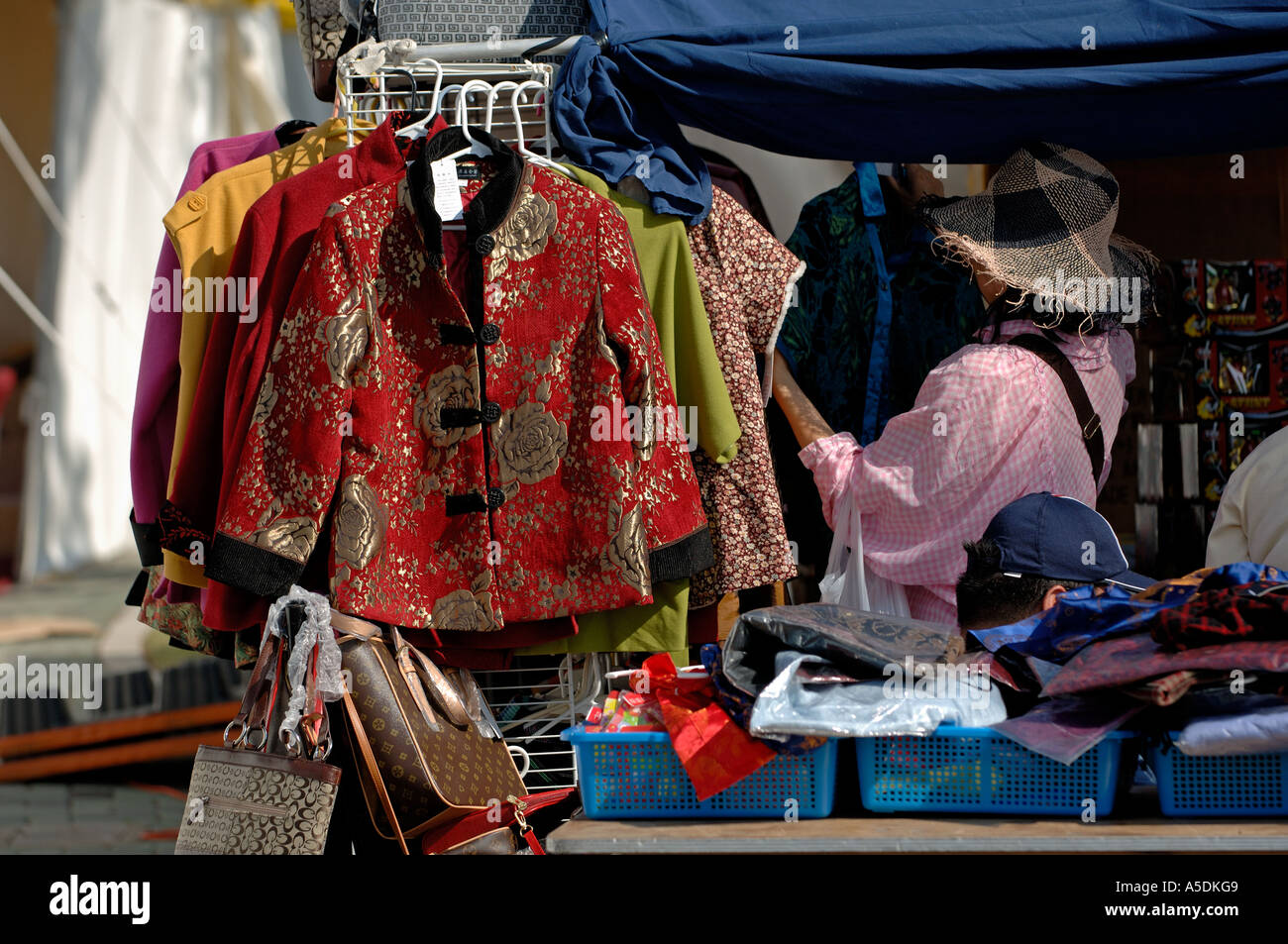 Street vendor selling Asian clothes at the Chinese Lantern Festival ...