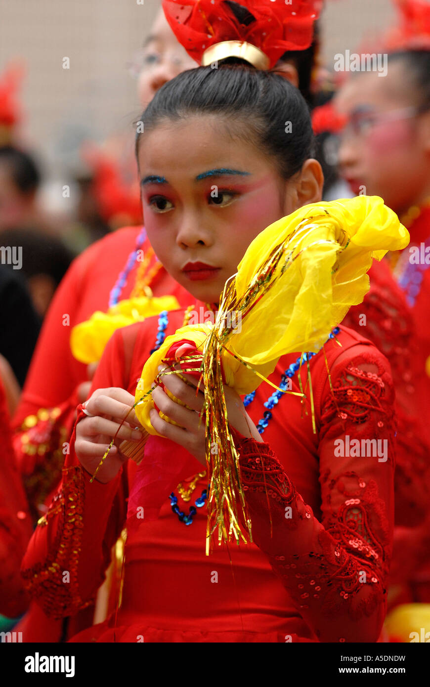 Young Chinese girls in festive outfits taking part in the Hong Kong ...
