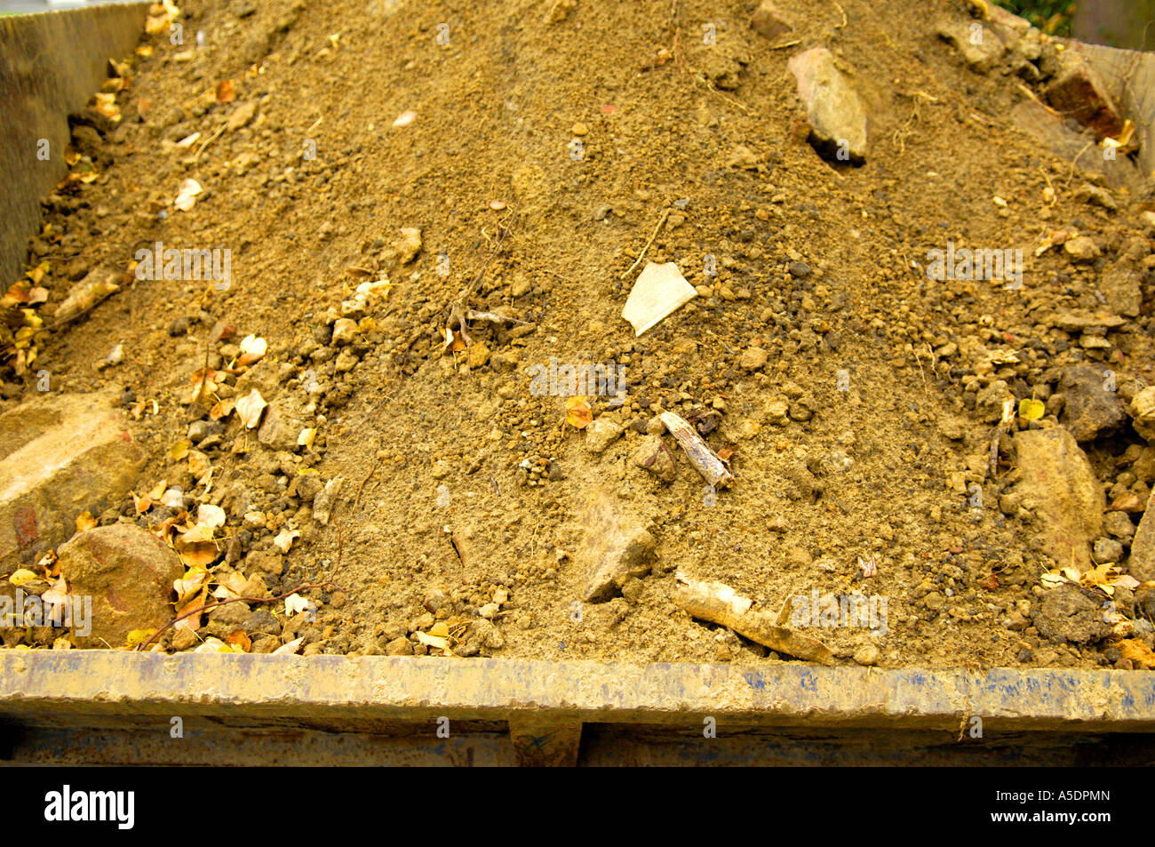 dirt skip earth soil Stock Photo - Alamy