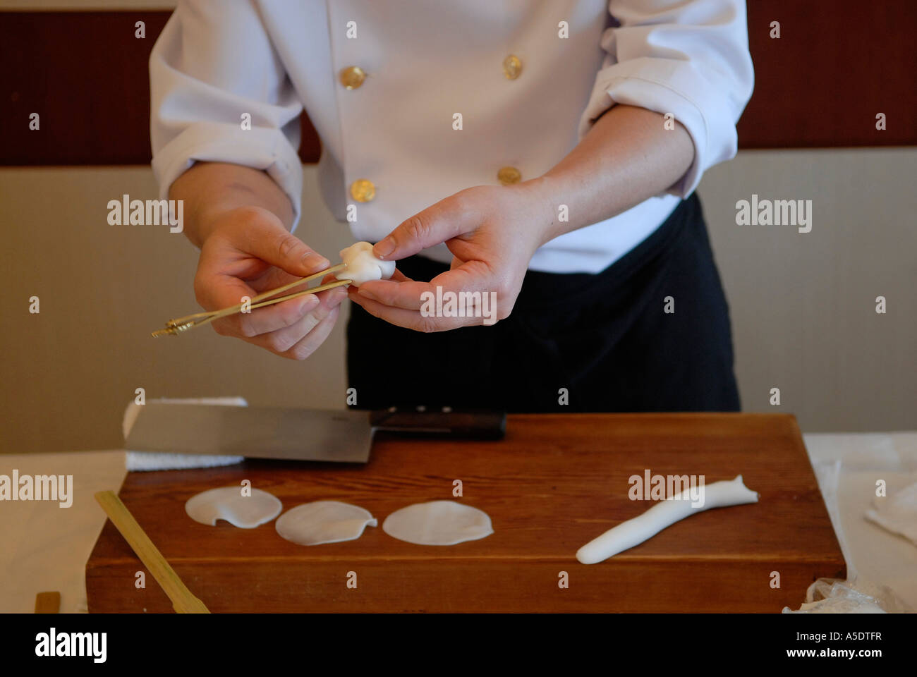 A chef preparing Dim Sum dumpling in a restaurant in Hong Kong China ...
