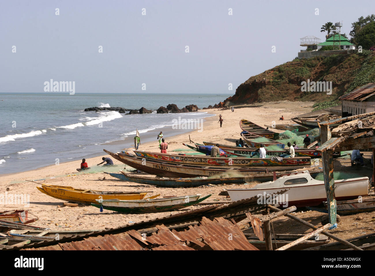 The Gambia Bakau fishing boats on the beach Stock Photo - Alamy