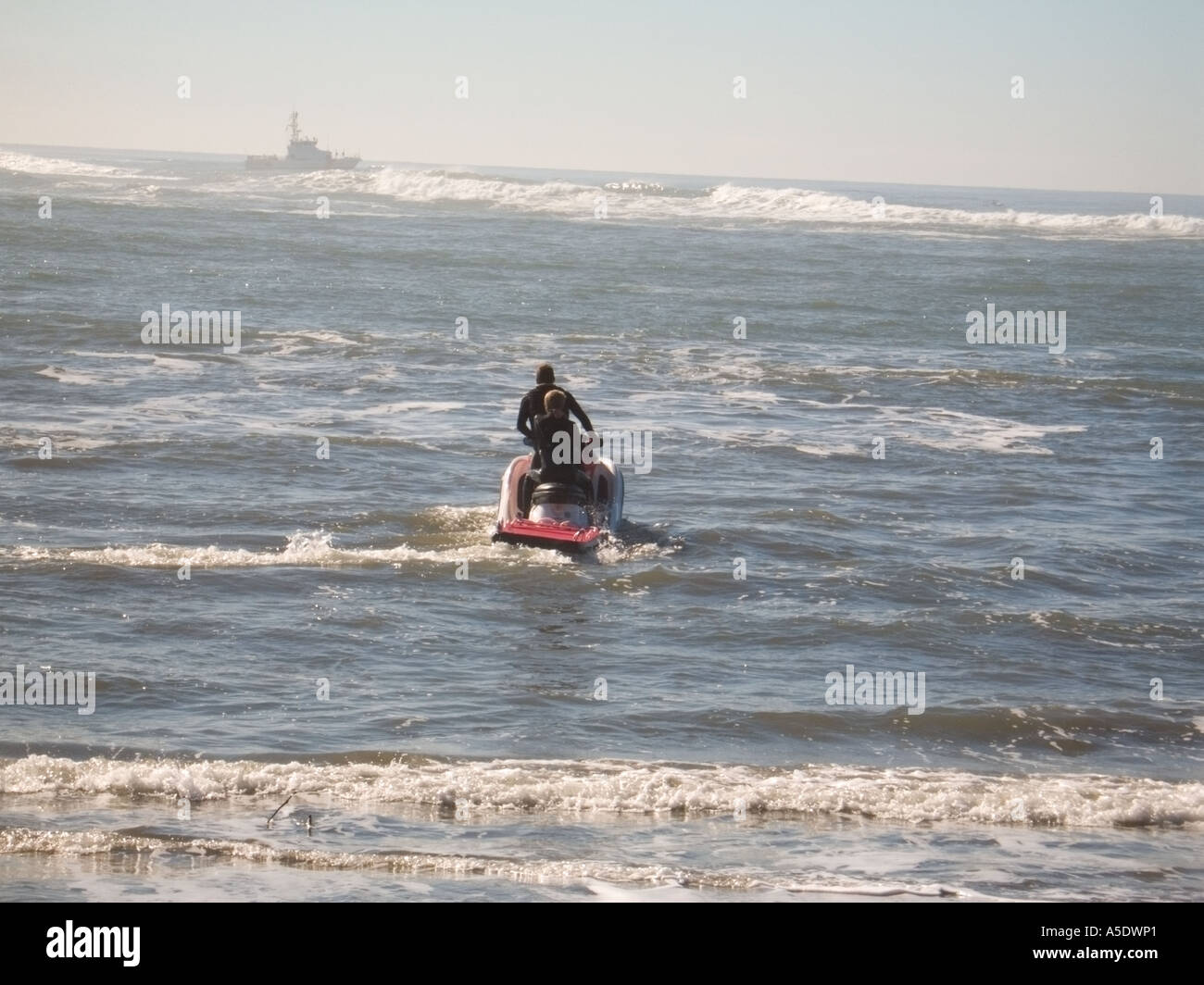 Jet ski and surfers hi-res stock photography and images - Alamy
