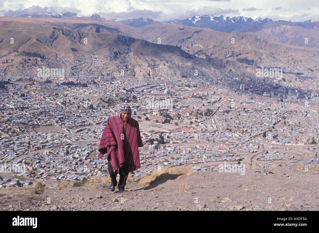 Bolivia Aymara Indian climbs up mountain from capital city La Paz onto ...