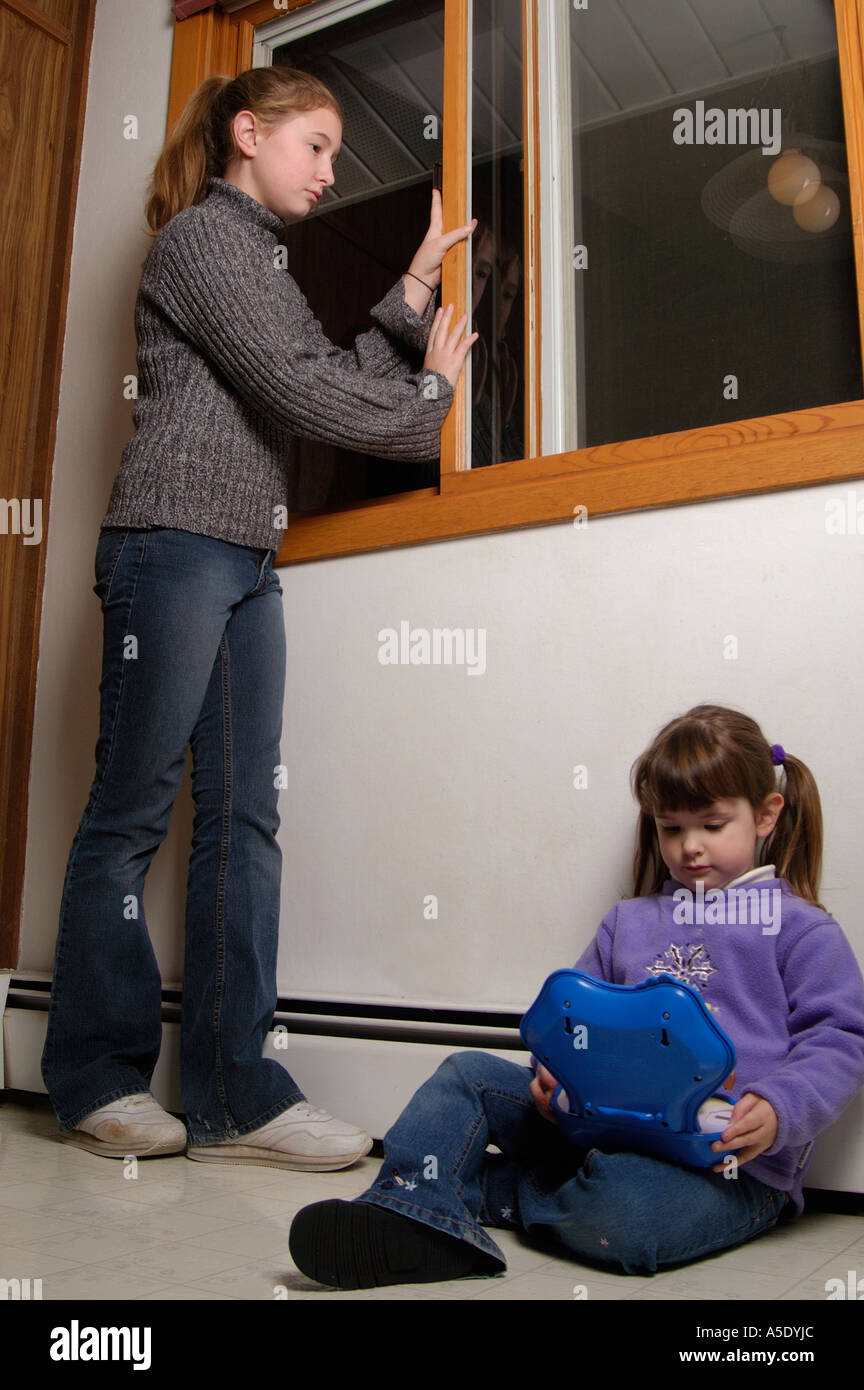 Babysitter Shutting Window, Child Stock Photo - Alamy