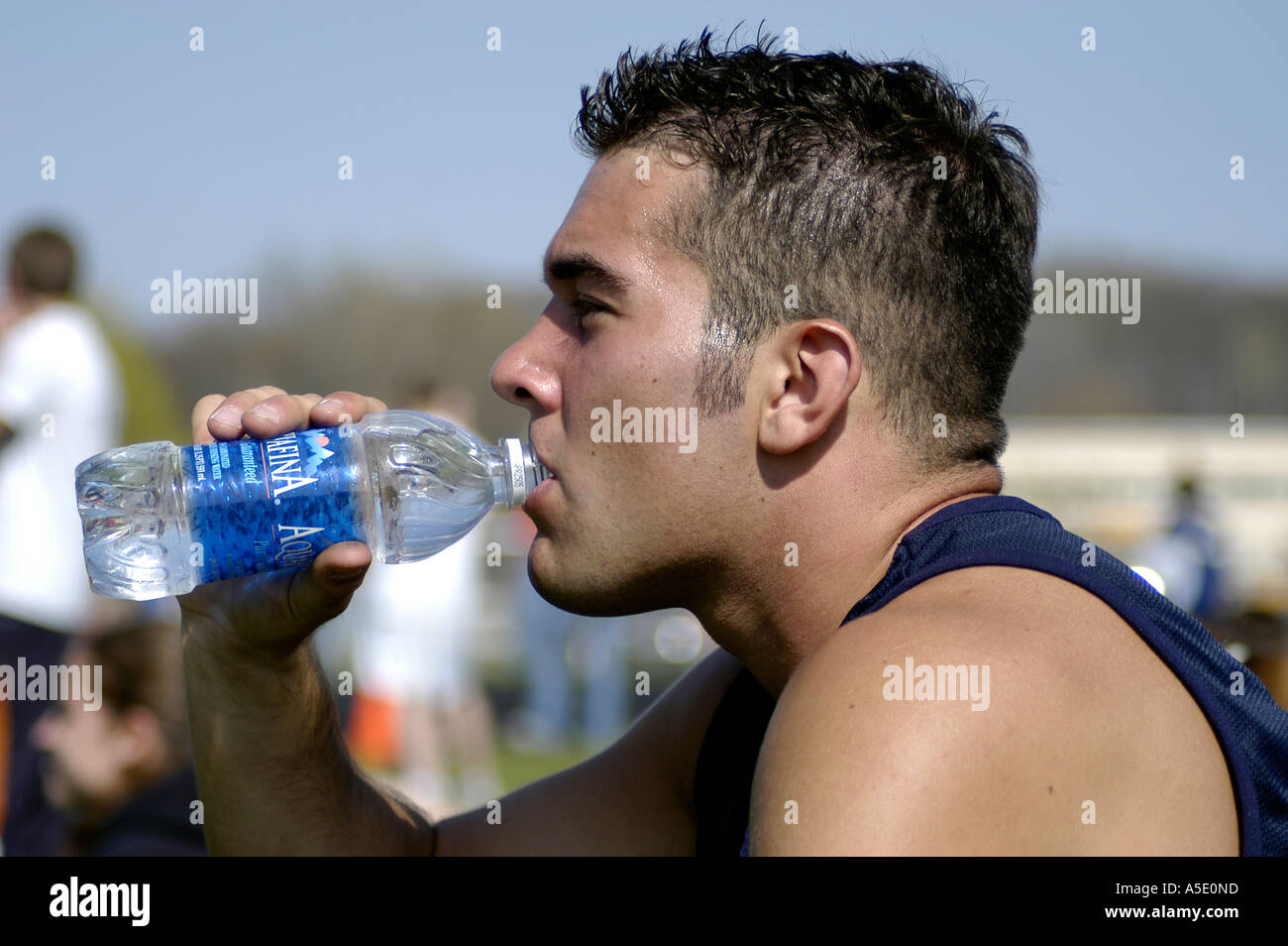 Teen Drinking Water After Exercise Stock Photo - Alamy