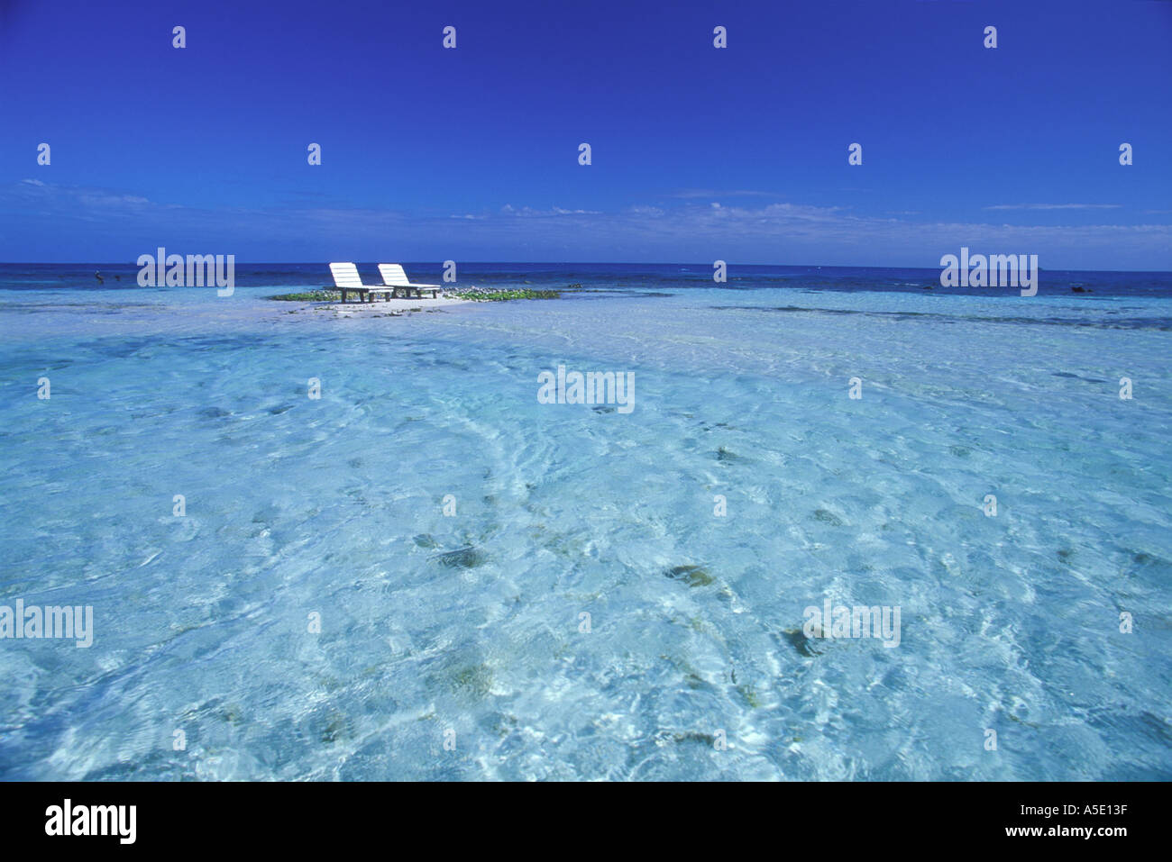 Two chairs on a sandbar in Belize Central America Caribbean Stock Photo ...