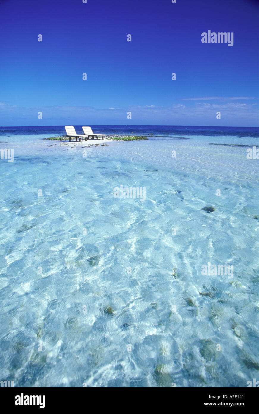 Two chairs on a sandbar in Belize Central America Caribbean Stock Photo ...