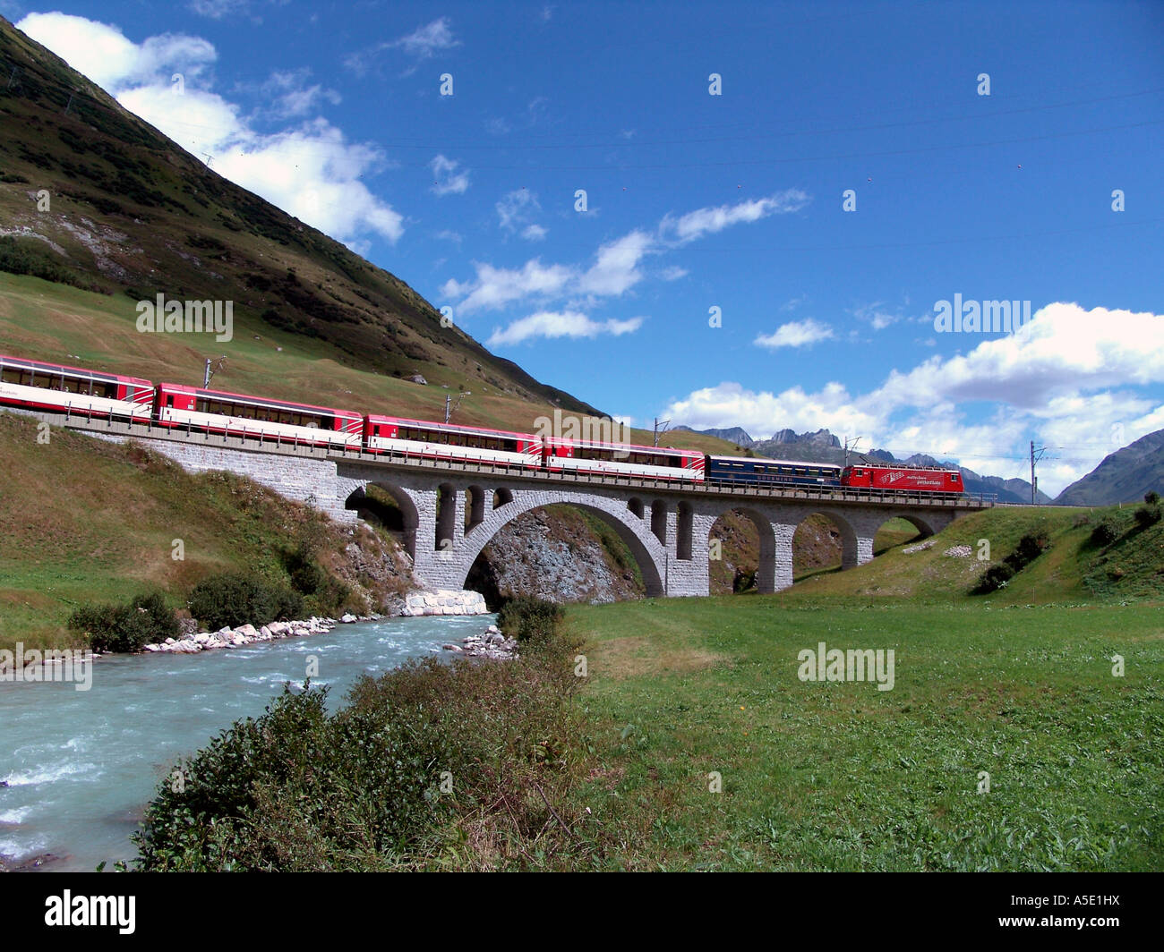 Glacier Express on the bridge of Richleren in the valley of Hospen ...