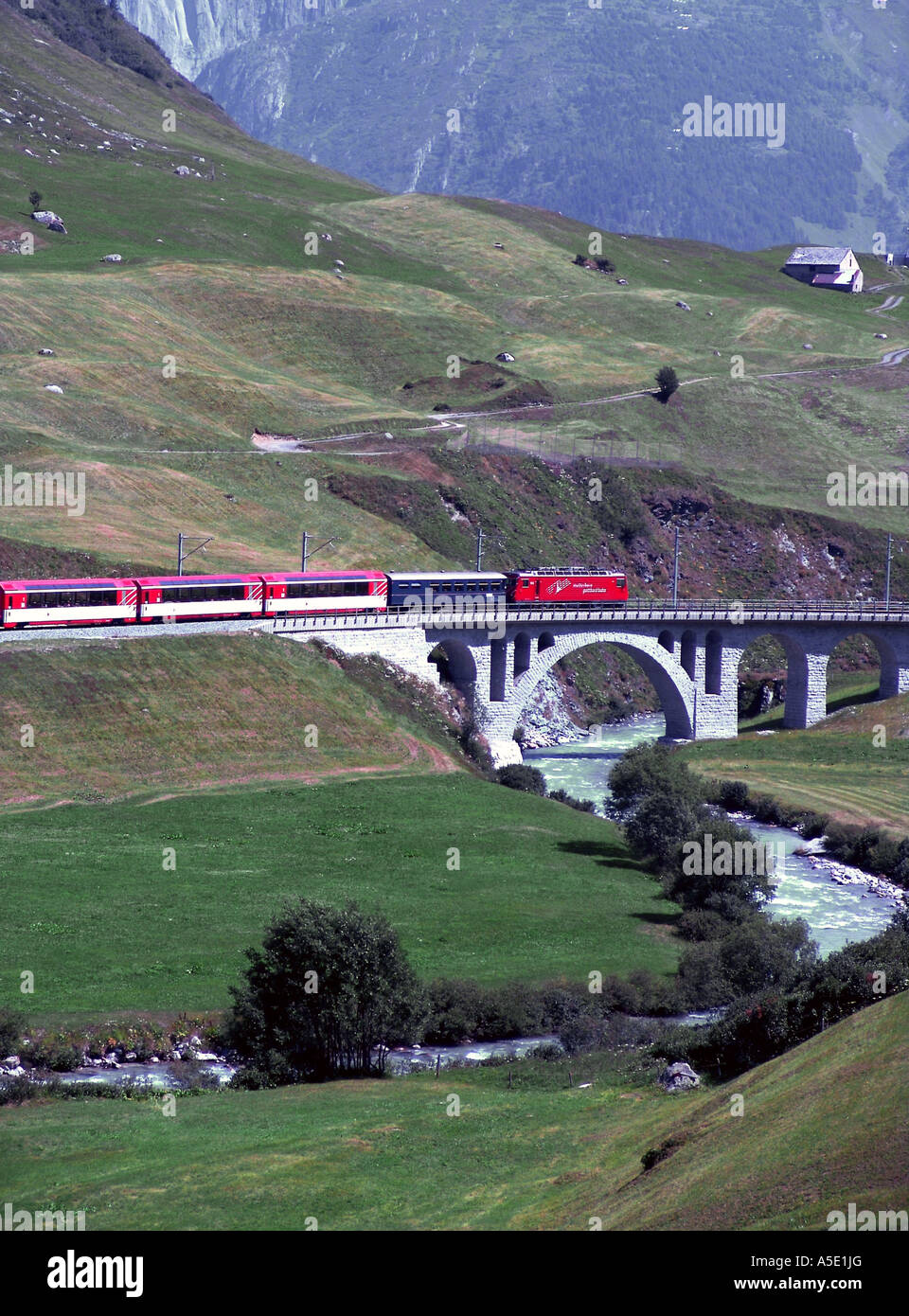 Glacier Express on the bridge of Richleren in the valley of Hospen ...