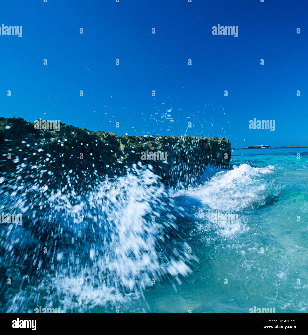 Water splashing on rocks Stock Photo - Alamy