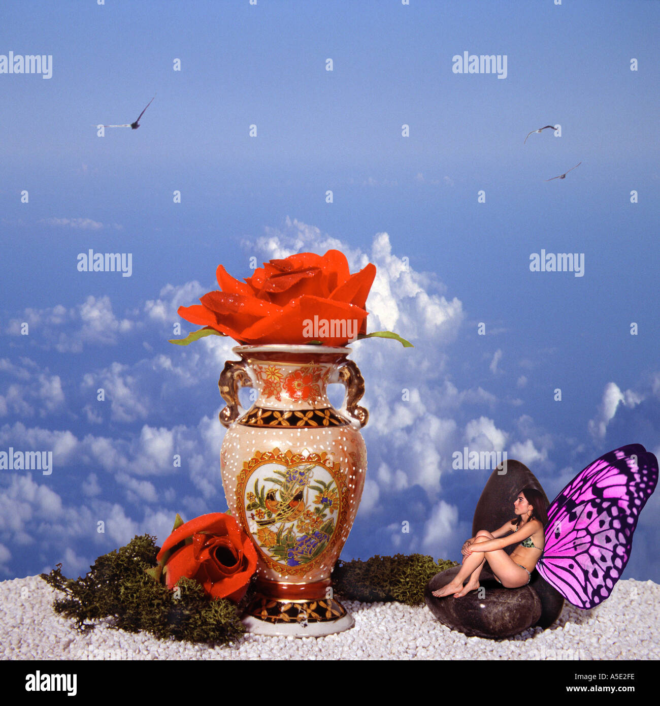 Elf and rose Stock Photo - Alamy