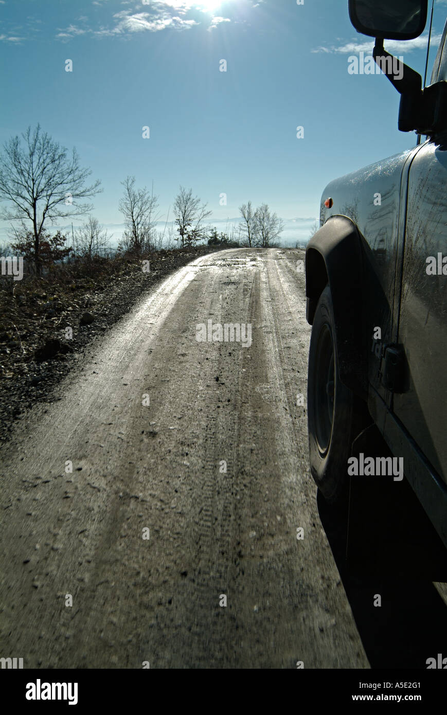 Off Road Vehicle Driving Along a Dirt Track Stock Photo - Alamy