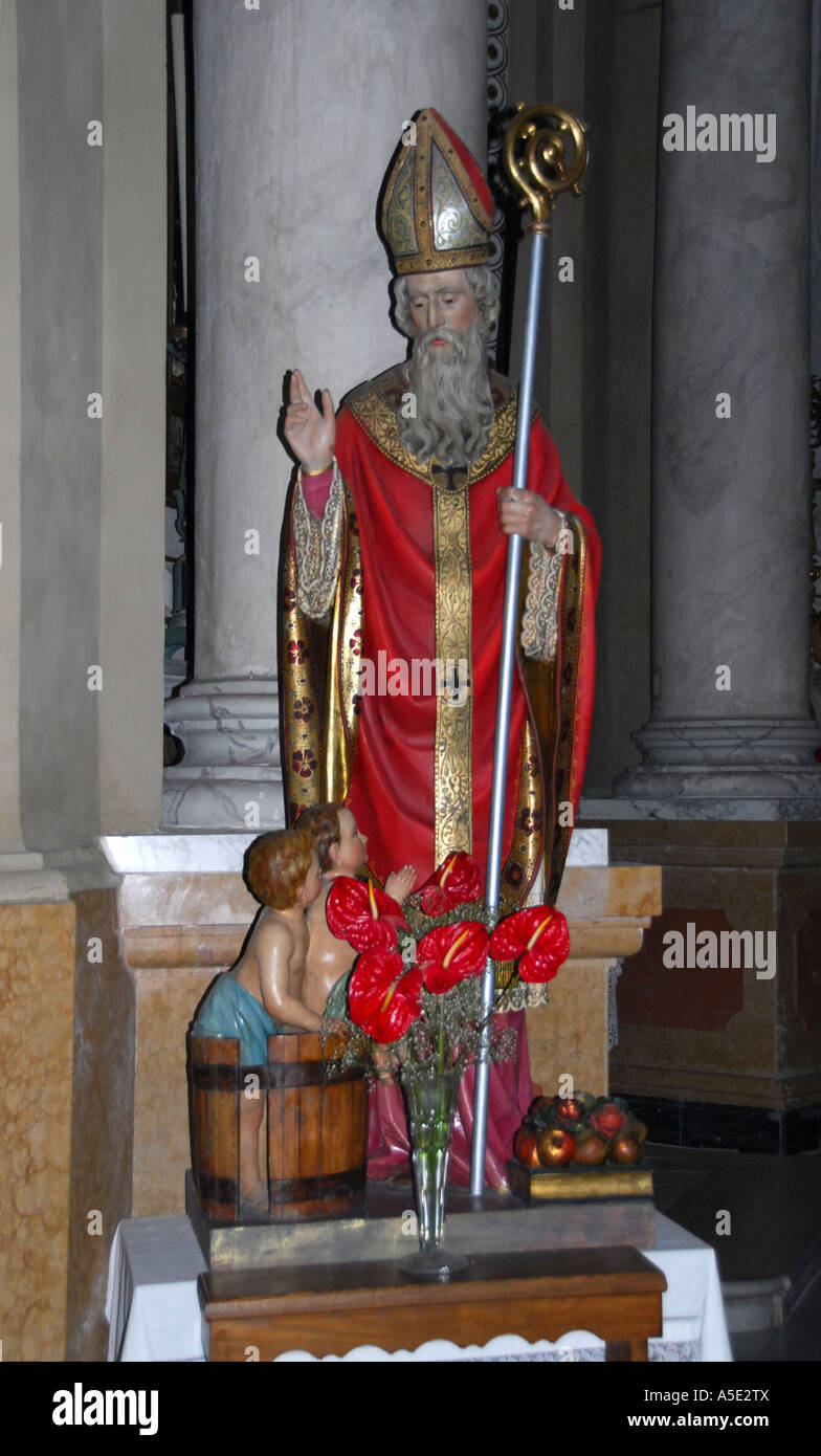 Statue of Saint Nicholas with children. Bagnone, Tuscany, Northern ...