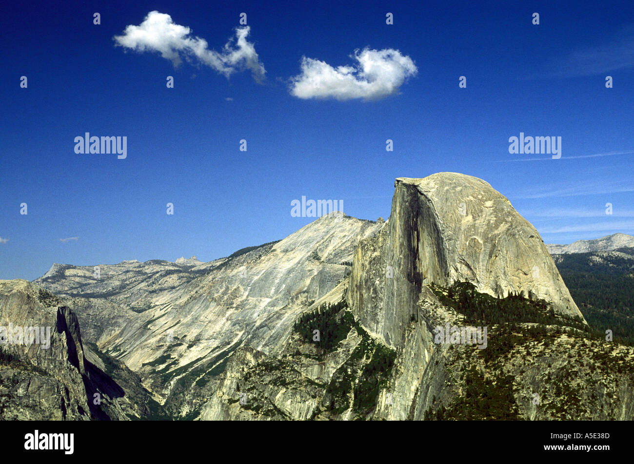 CUMULUS CLOUDS ABOVE HALF DOME FROM GLACIER POINT YOSEMITE NATIONAL ...